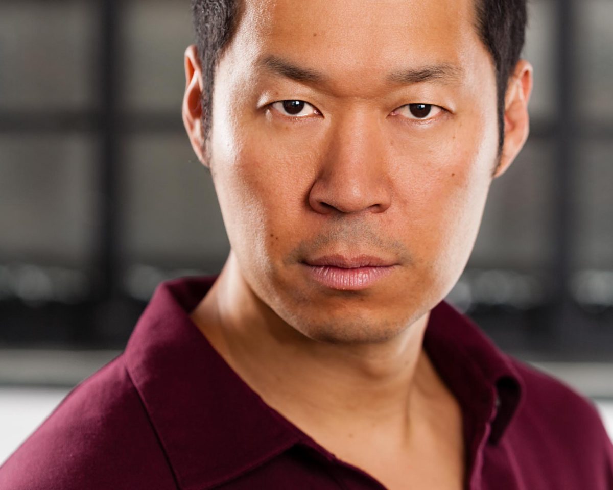 14-Asian american actor headshot with intense stare – Headshots NYC